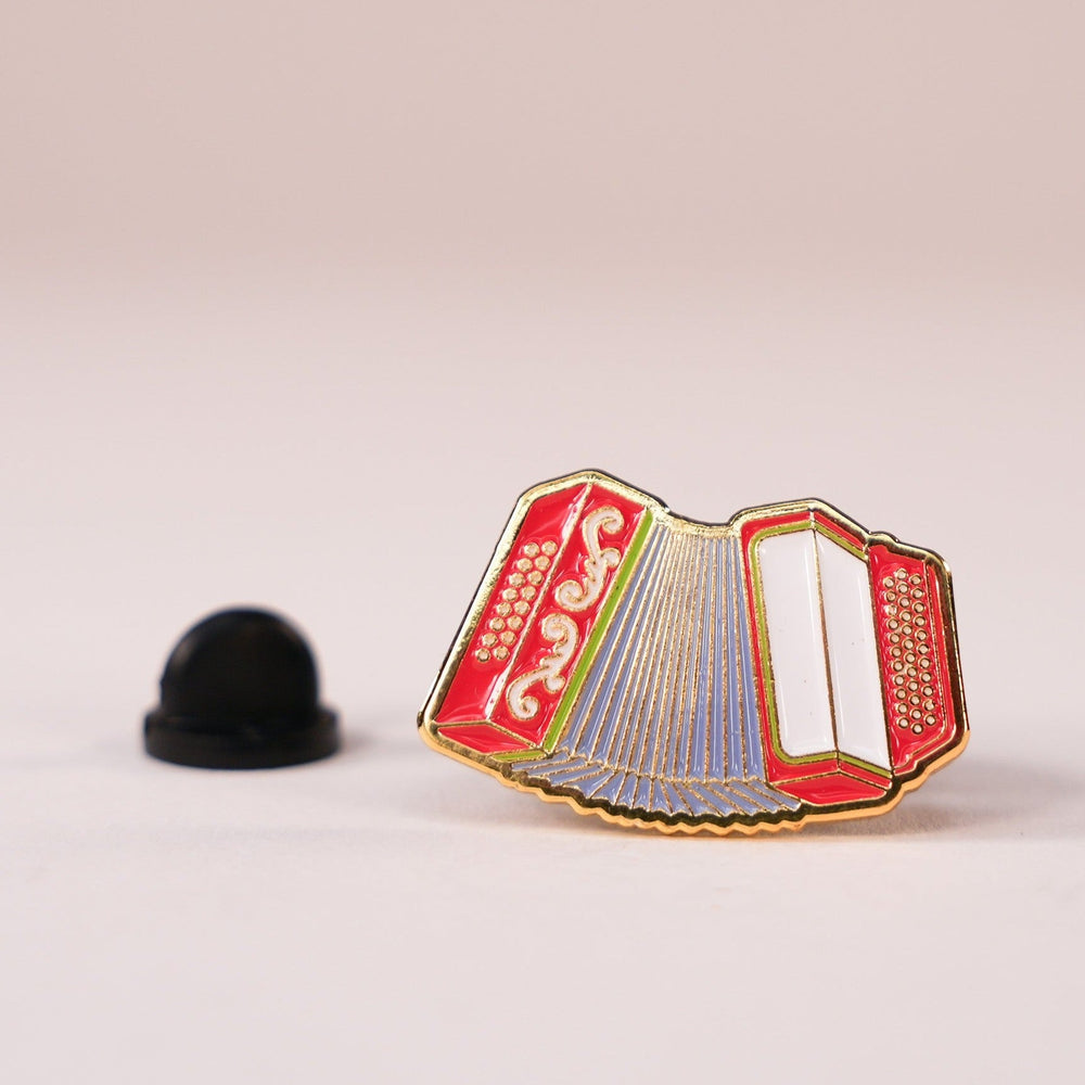 Squeeze Box Enamel Pin